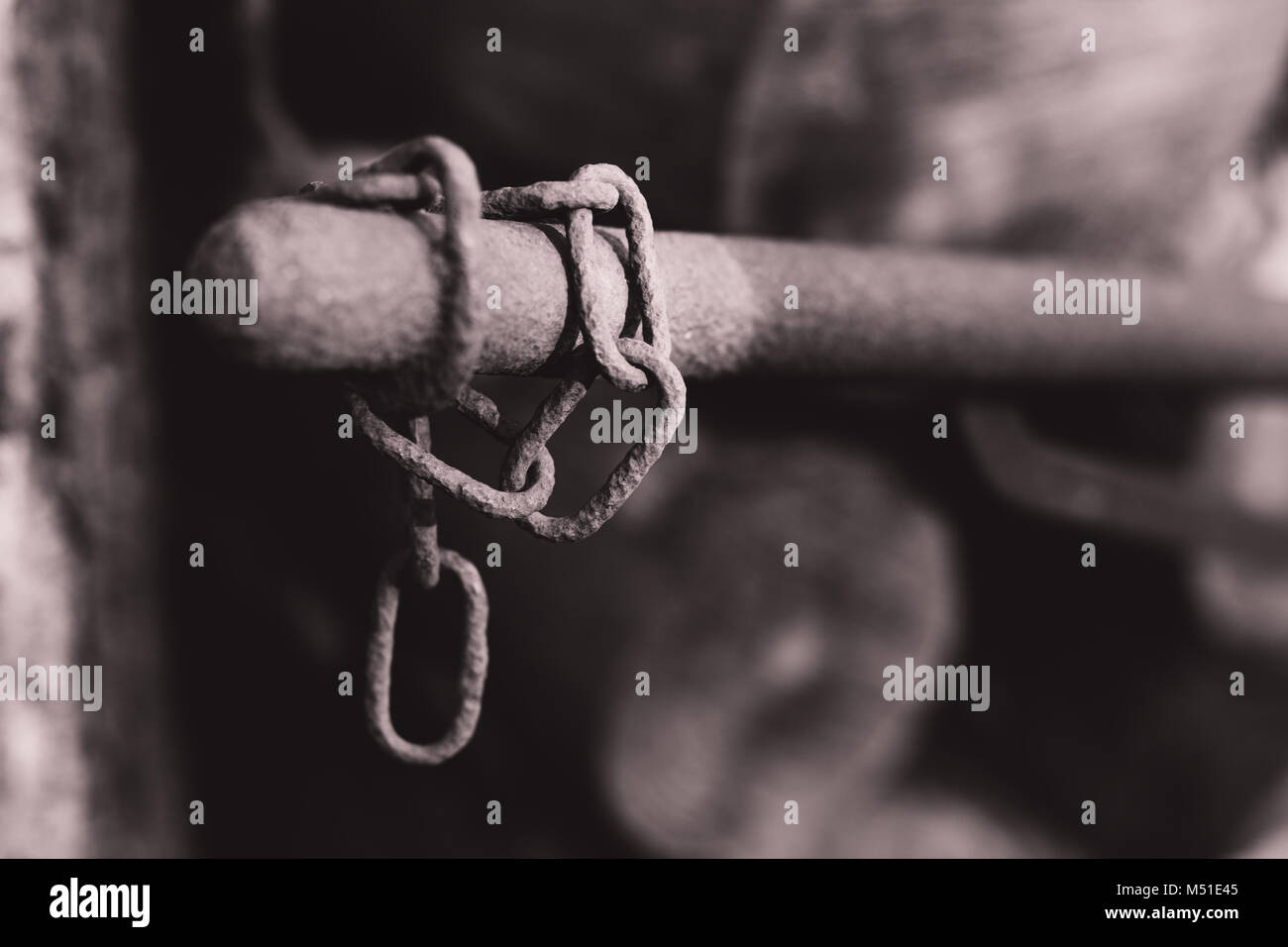 a hanging old rusty chain Stock Photo - Alamy
