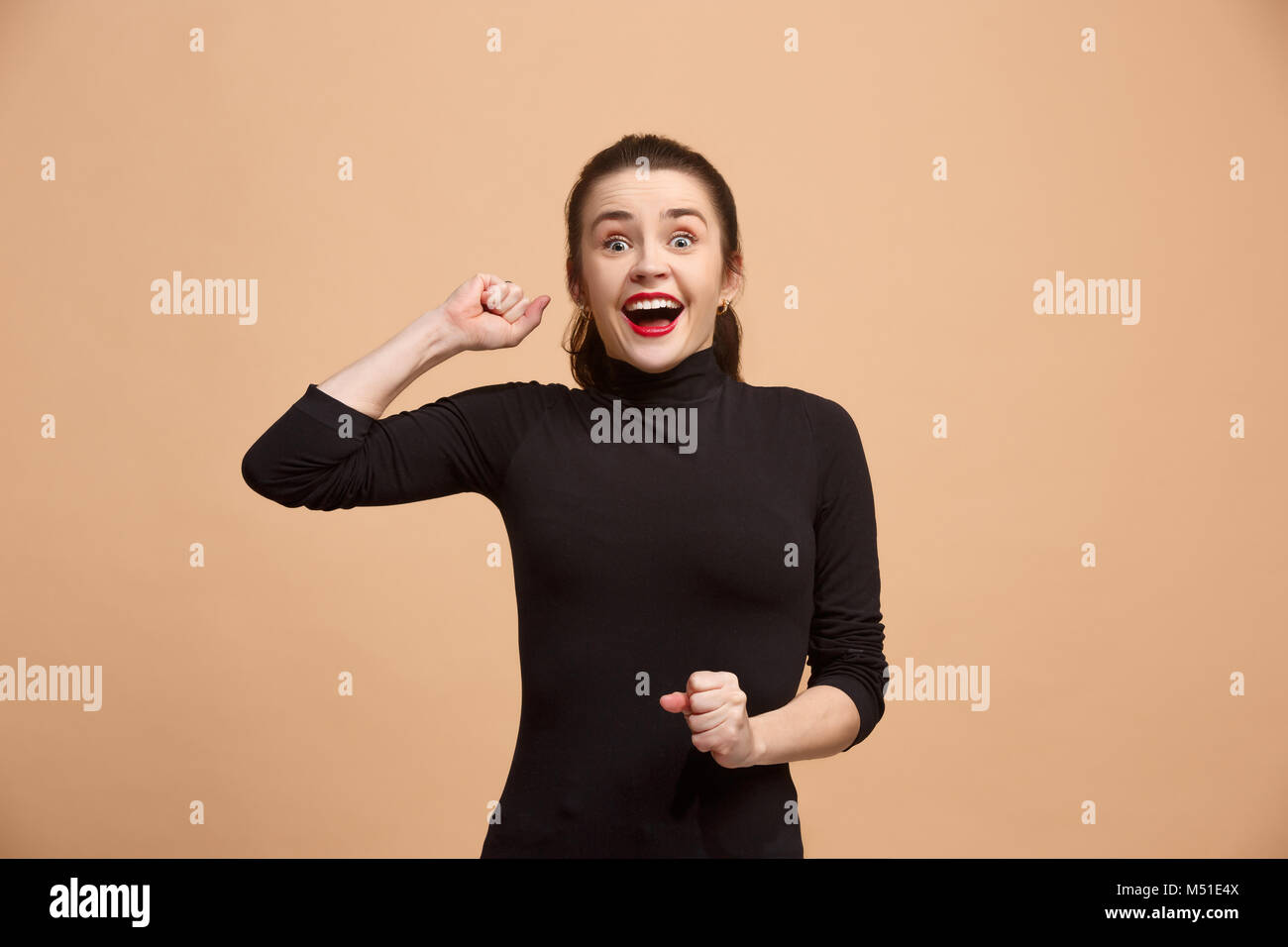 Winning success woman happy ecstatic celebrating being a winner ...