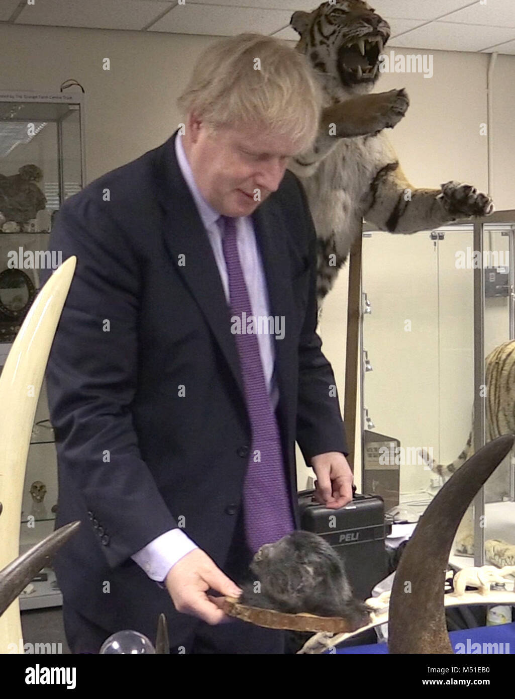 Grab taken from PA video of Foreign Secretary Boris Johnson holding a ...