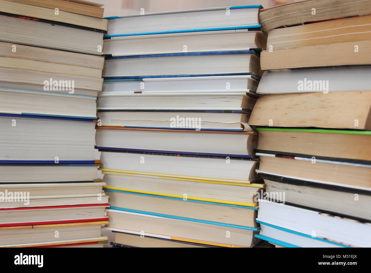 Stacked collection of books Stock Photo - Alamy