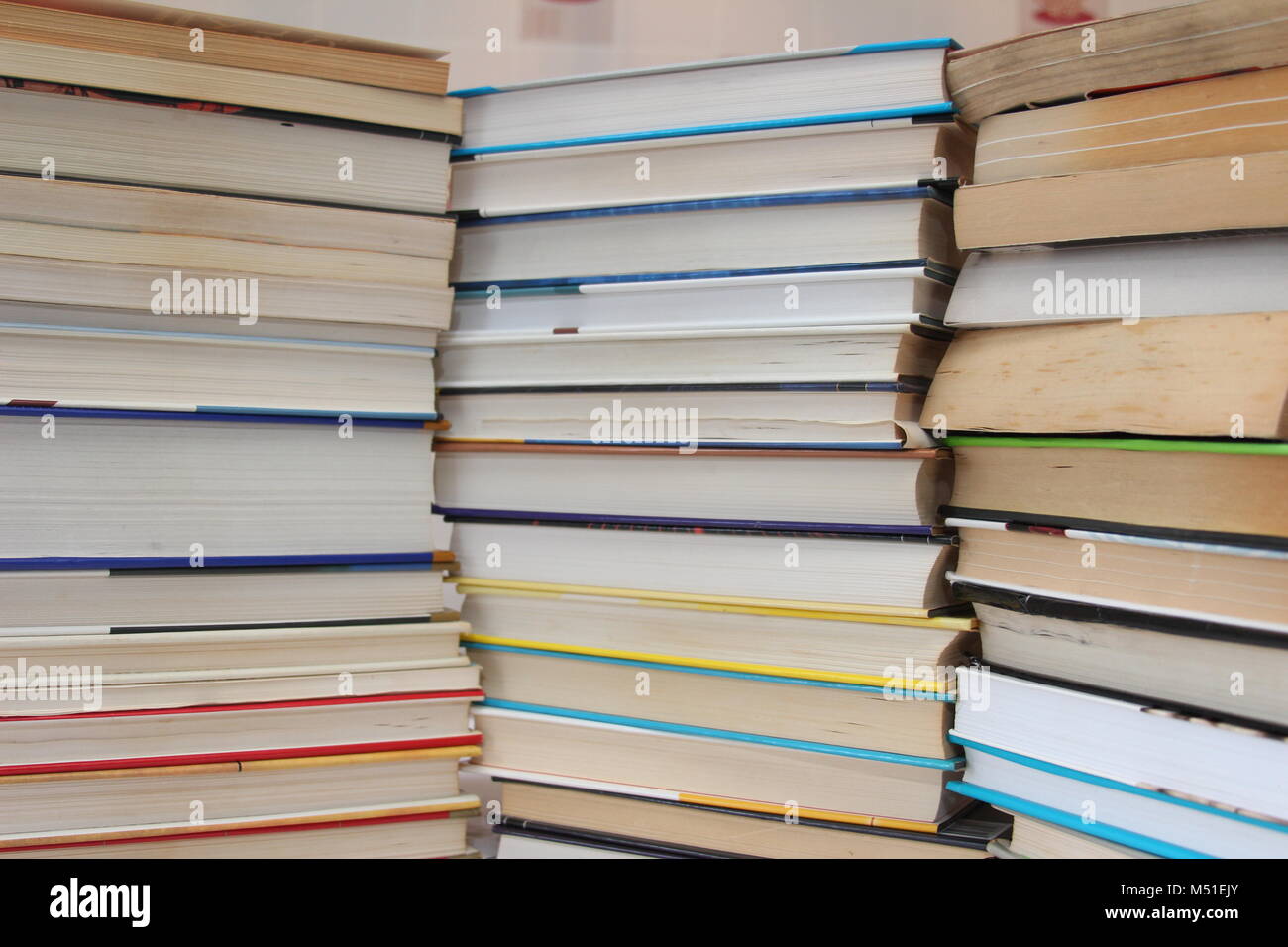 Stacked collection of books Stock Photo - Alamy