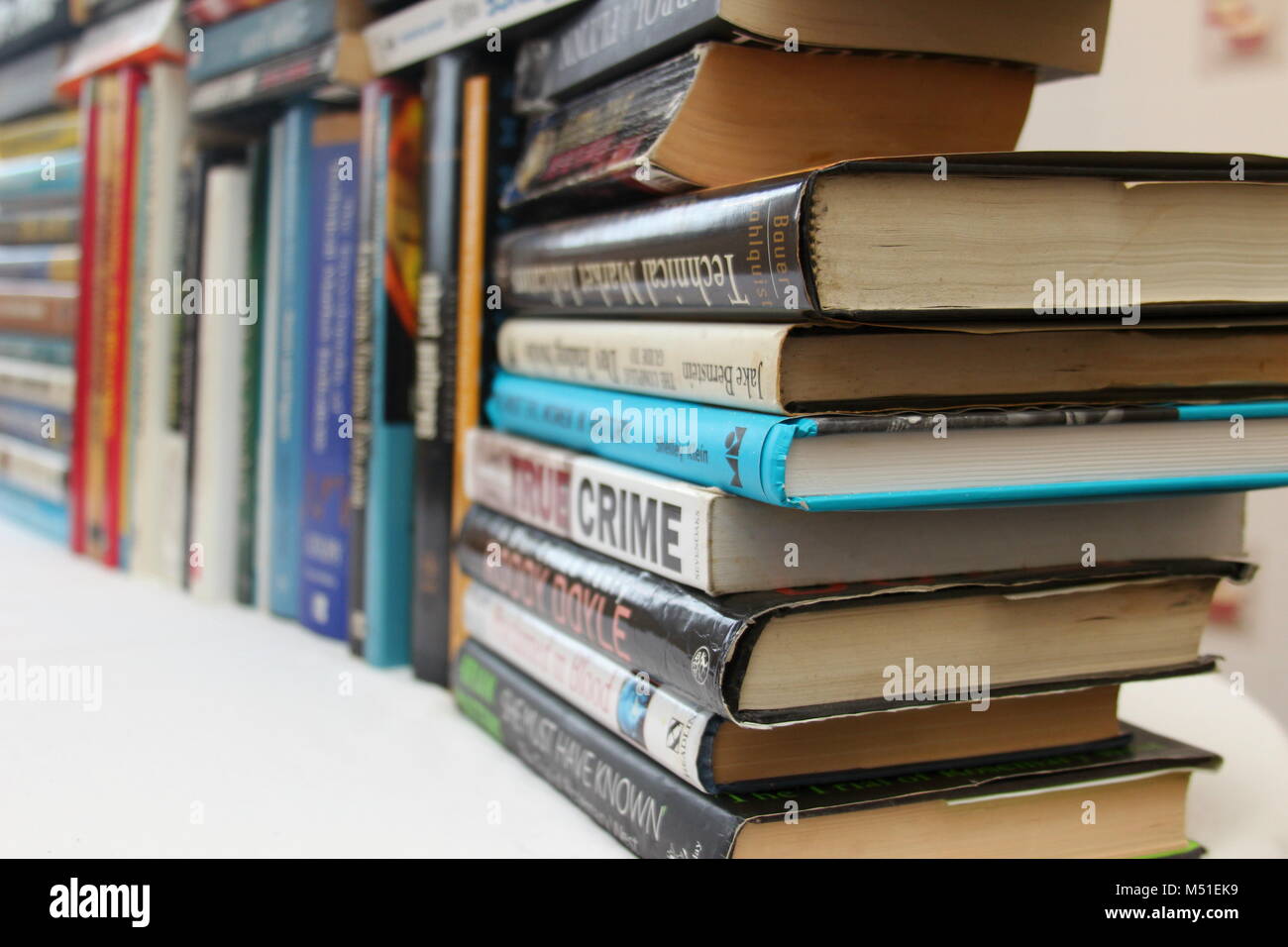 Stacked collection of books Stock Photo - Alamy