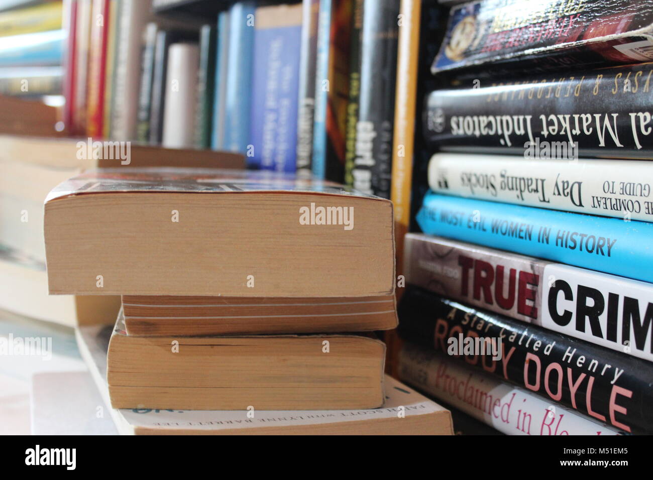 Stacked collection of books Stock Photo - Alamy