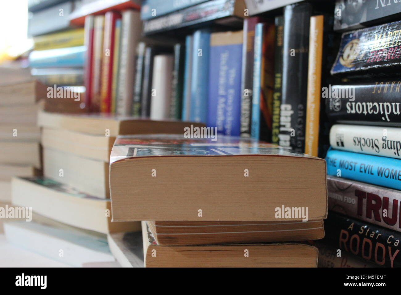 Stacked collection of books Stock Photo - Alamy