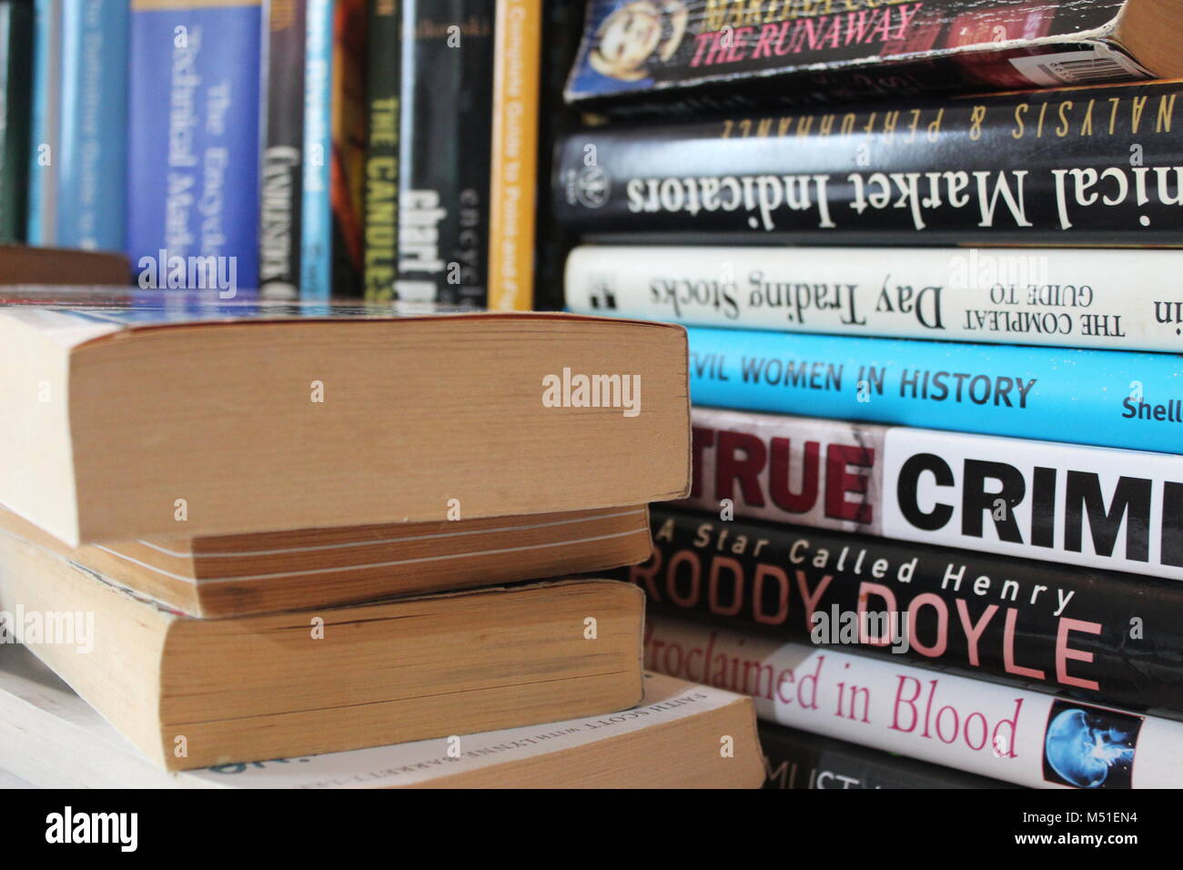 Stacked collection of books Stock Photo - Alamy