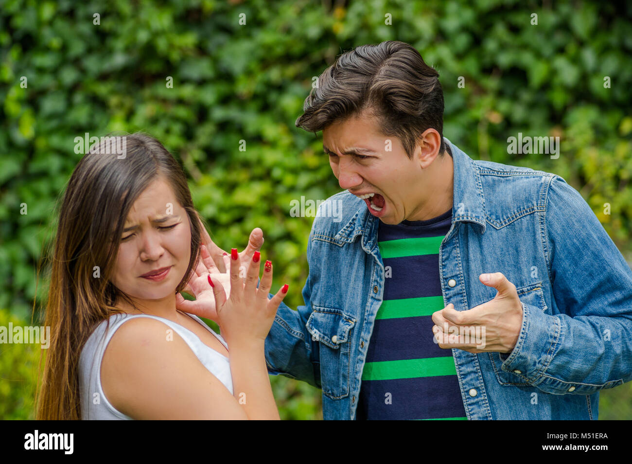 Couple fighting. A young man screaming a young woman while the young ...