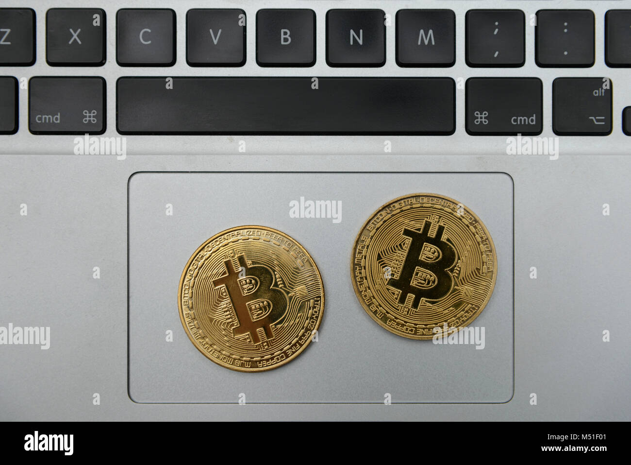 Bitcoin coins on computer hi-res stock photography and images - Alamy