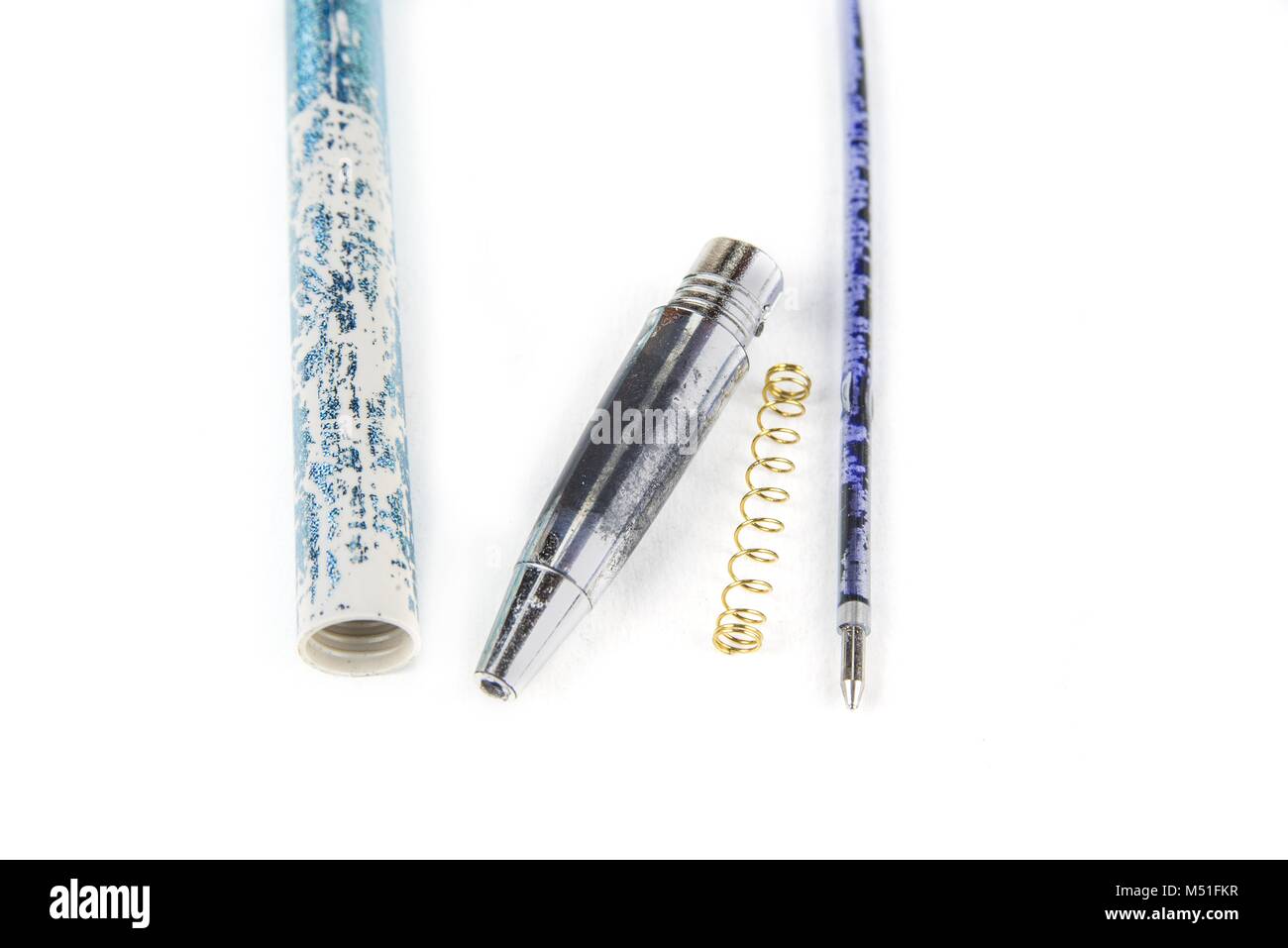 Dismantled empty old pen. Write out pen on the white Stock Photo - Alamy