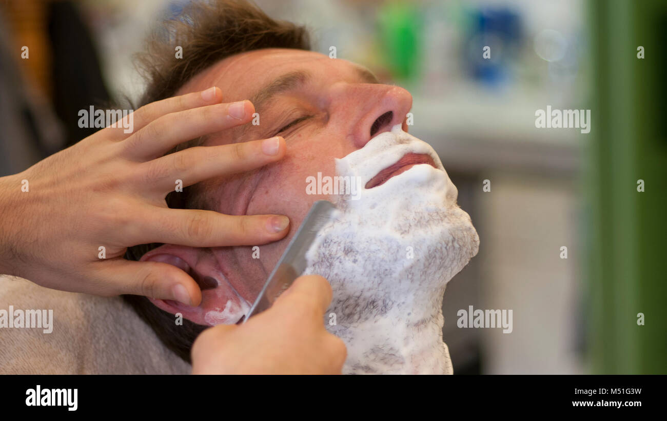 Cut Throat Shave By Barber Stock Photos & Cut Throat Shave By Barber ...