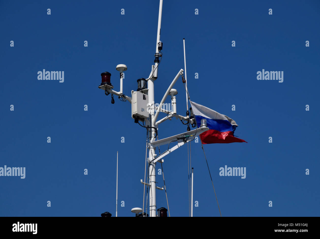Mast of the port service ship. Devices of light signaling and ...