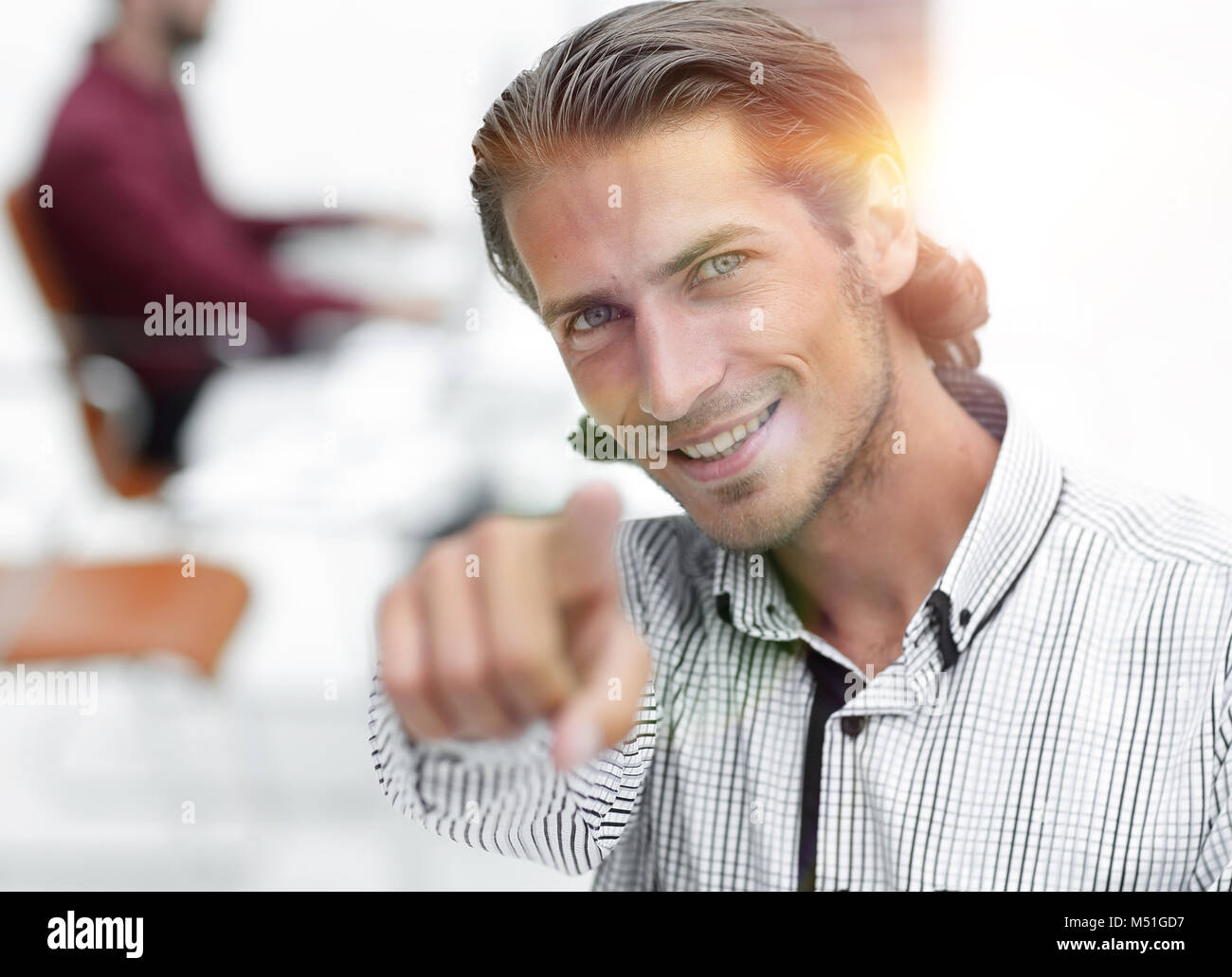 successful employee pointing forward Stock Photo - Alamy