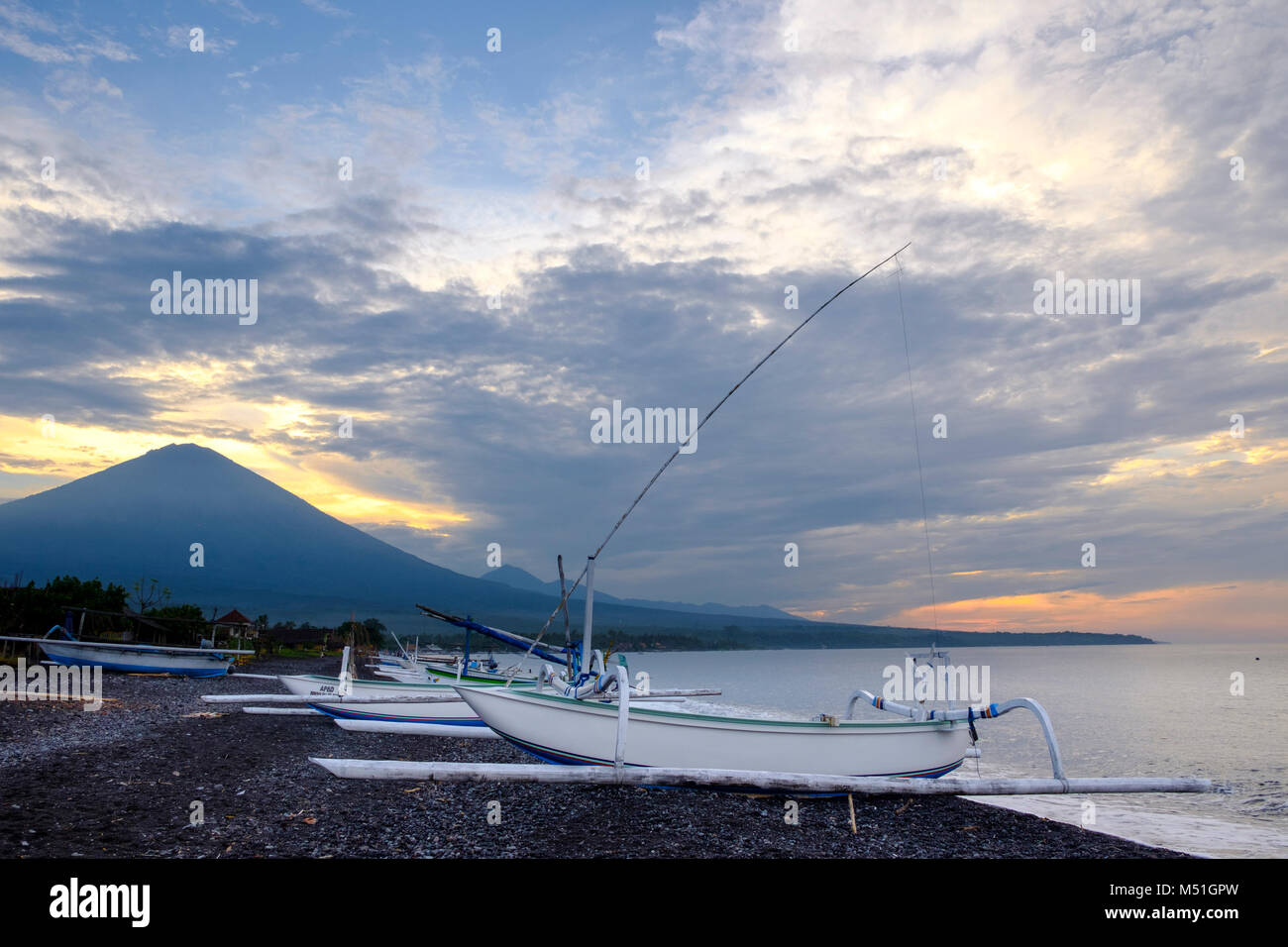 Traditional Balinese fishing boats or outrigger canoes ('jukung') on ...