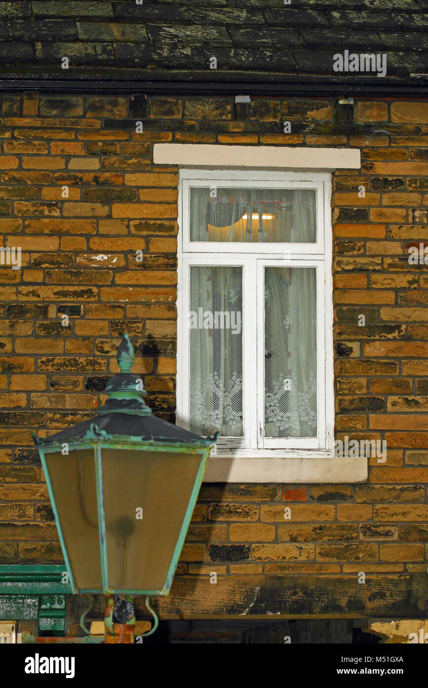 Old fashioned street light outside of a house Stock Photo - Alamy