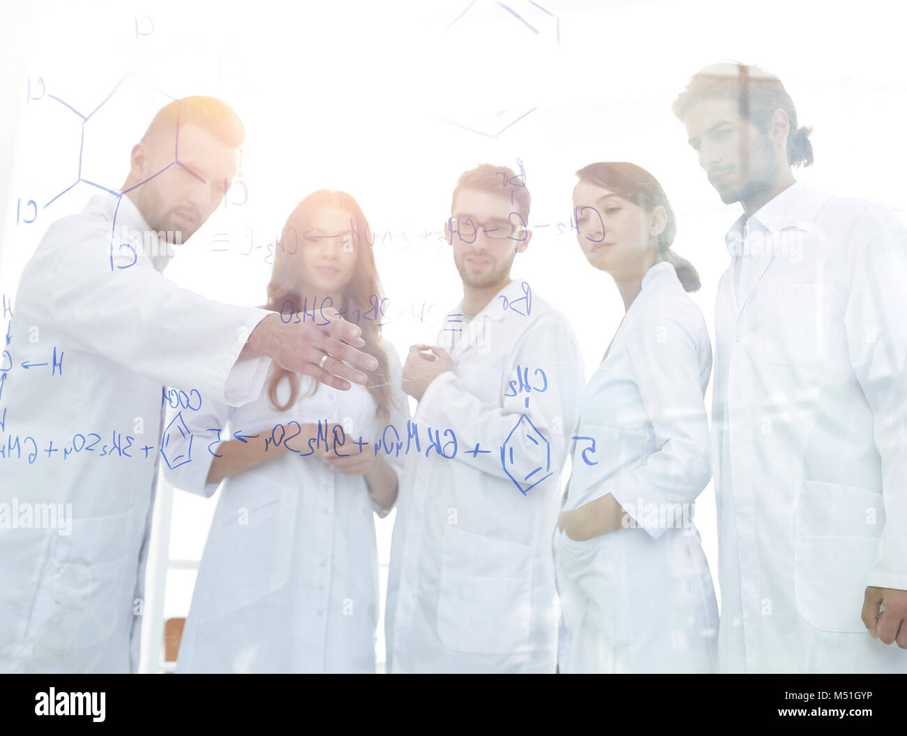 in the background image group laboratory scientists discussing t Stock ...