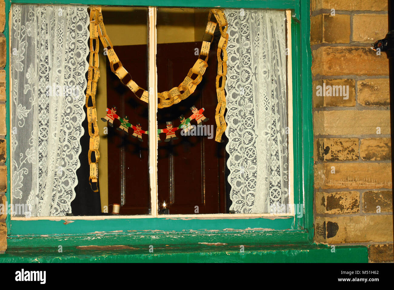 Old fashioned Christmas decorations at a house window Stock Photo - Alamy