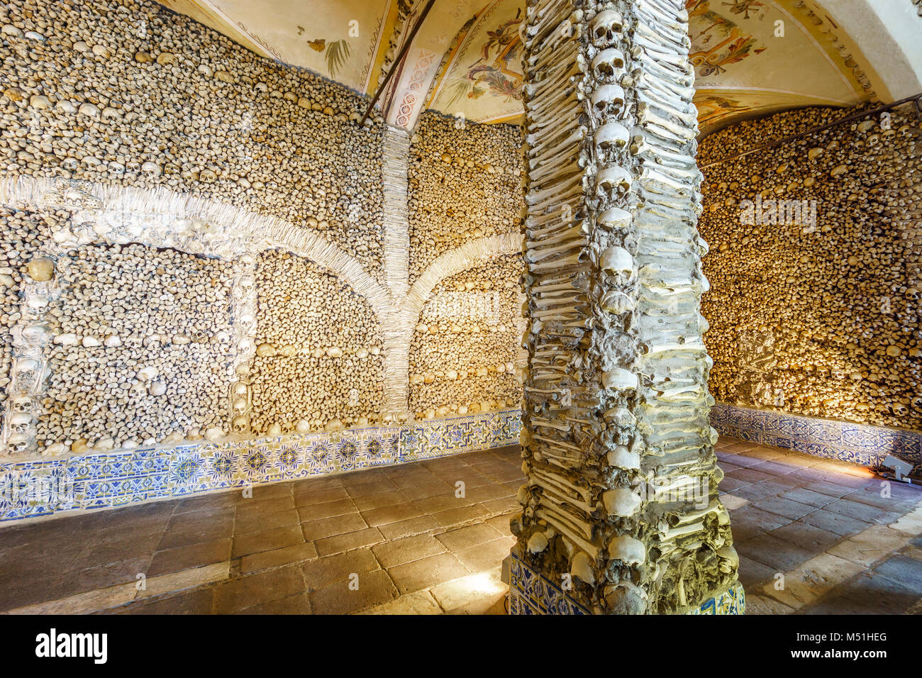 Wide-angle close-up of a bone-laid pillar and wall, Chapel of Bones in ...