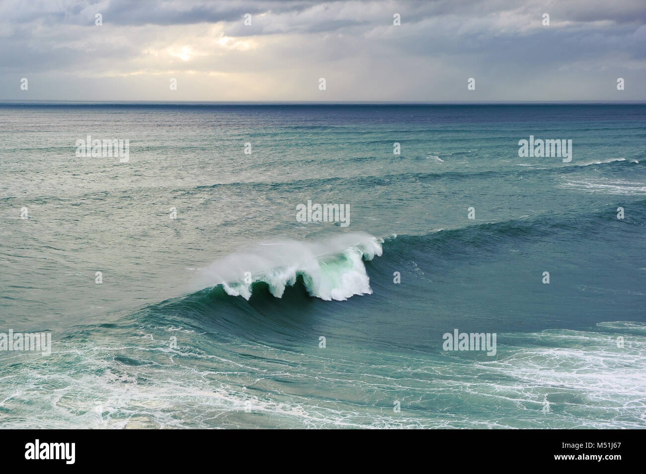 Huge ocean wave breaking in Nazare, Portugal Stock Photo - Alamy
