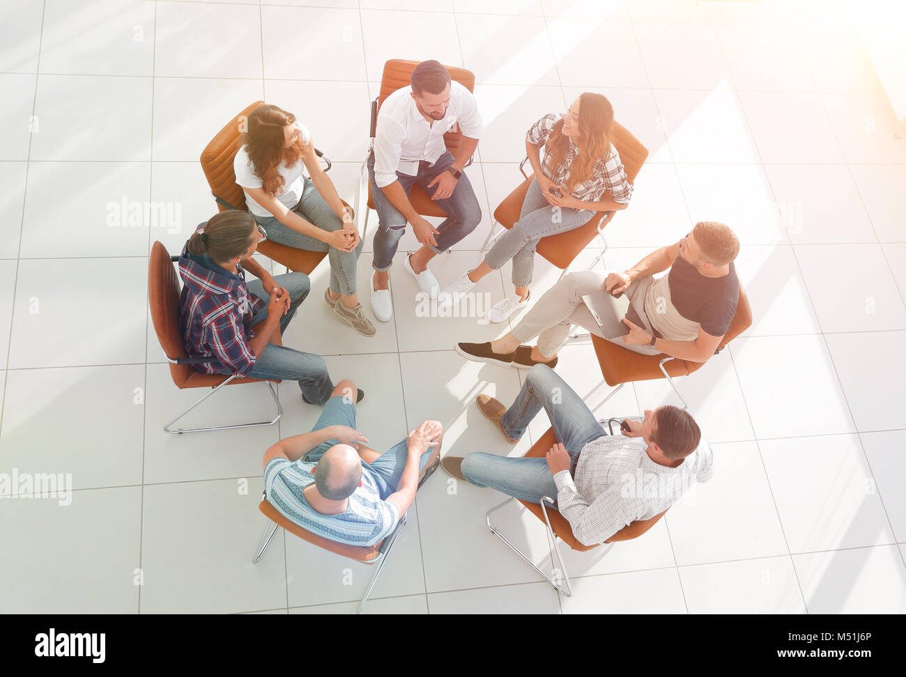 creative team sitting in class for team building Stock Photo - Alamy
