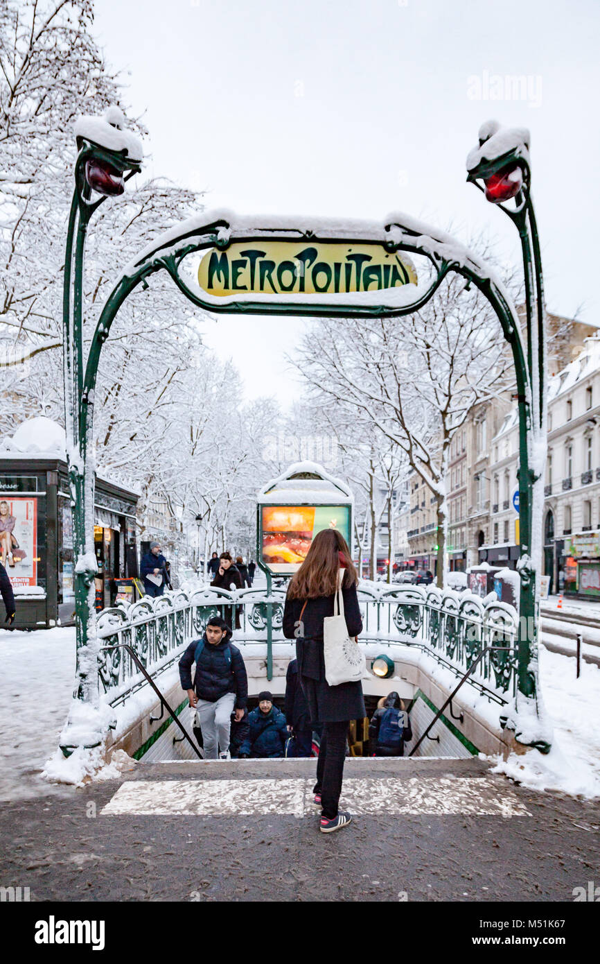 Snow covered subway entrance Metropolitain in Paris France Stock Photo ...
