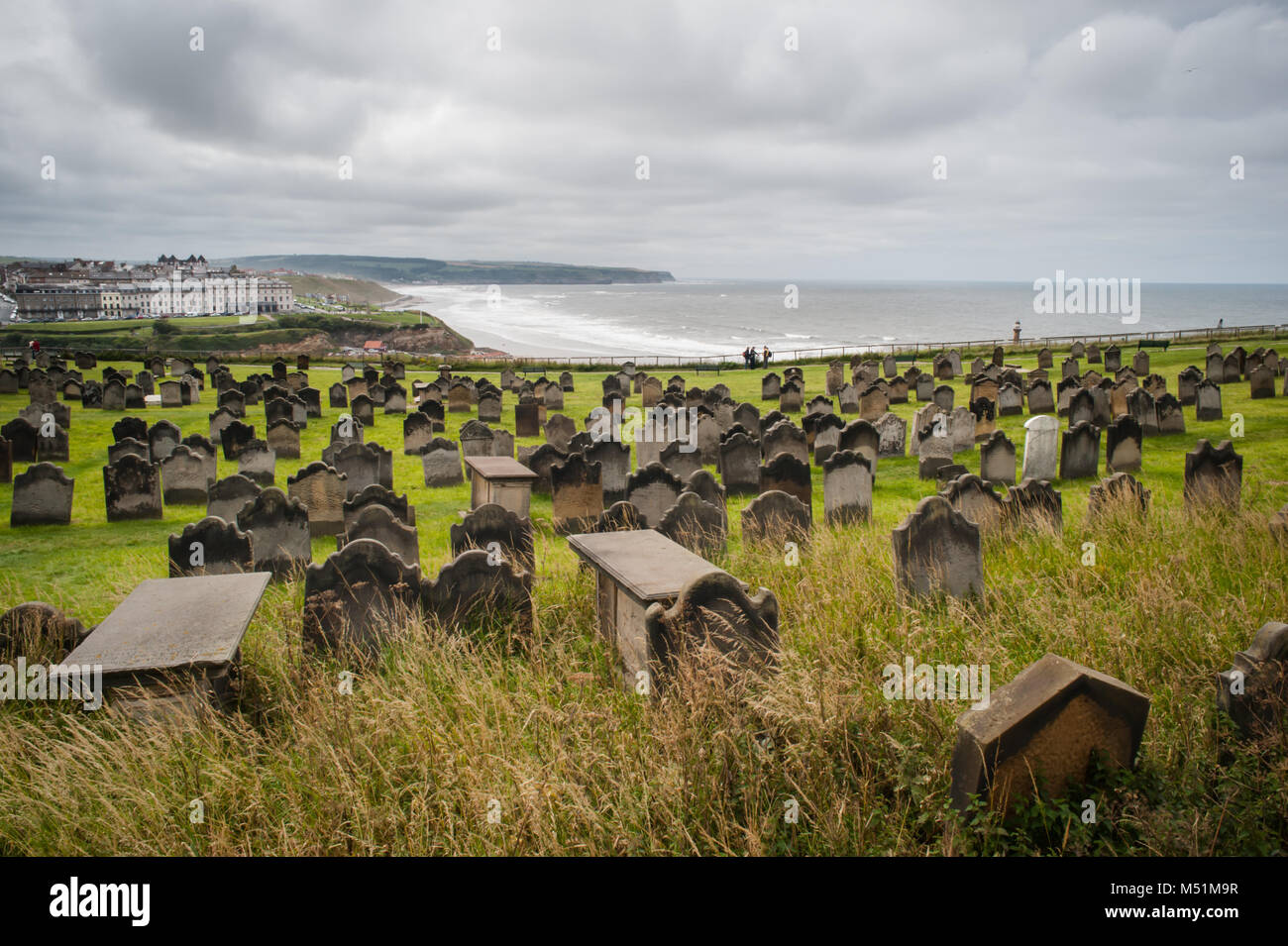 A graveyard overlooking the North Sea coast at Whitby, North Yorkshire ...