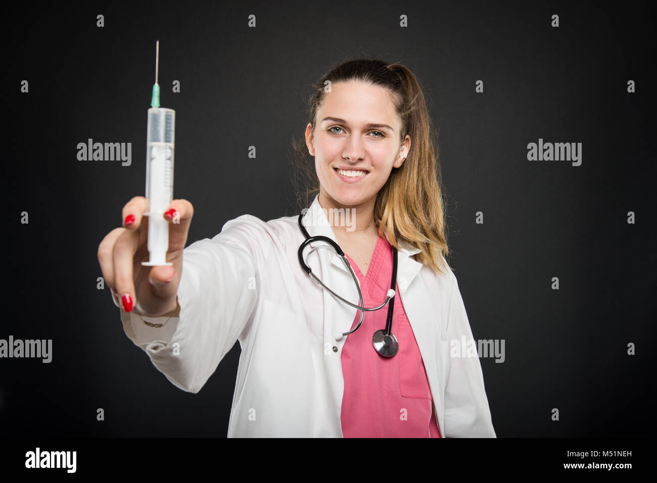 Doctor big needle hi-res stock photography and images - Alamy
