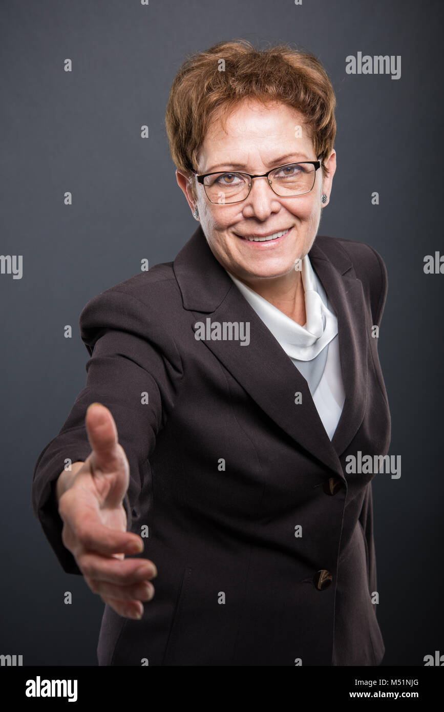 Mature woman offering hand hi-res stock photography and images - Alamy