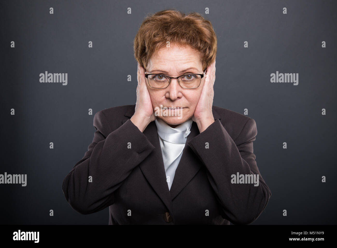 Holding hands over ears hi-res stock photography and images - Alamy