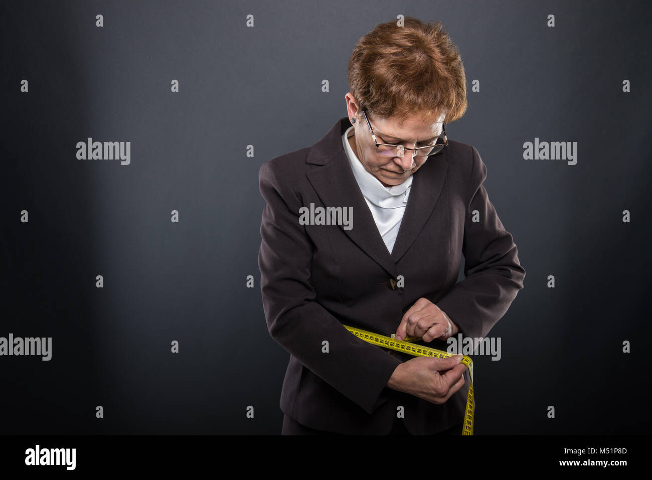 Lady measuring hi-res stock photography and images - Alamy