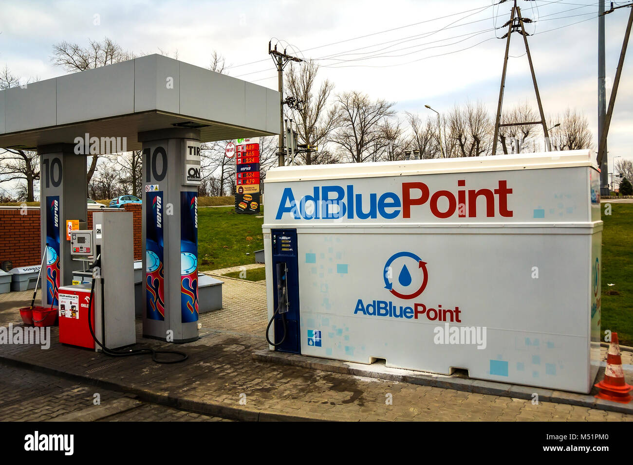 The AdBlue tank at the gas station on highway rest stop. AdBlue is a ...