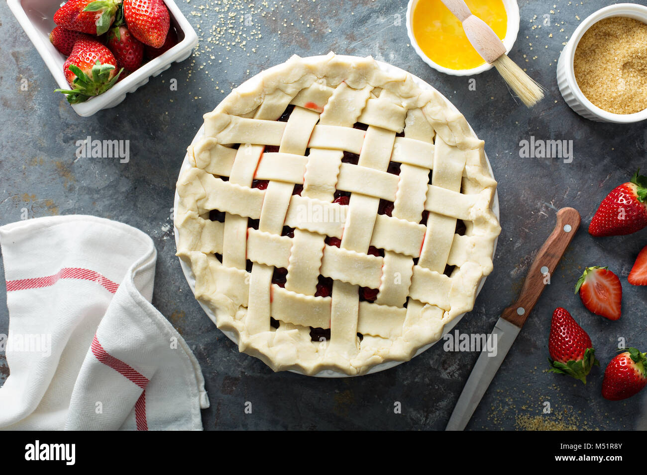 Making strawberry pie from scratch with homemade crust lattice and ...