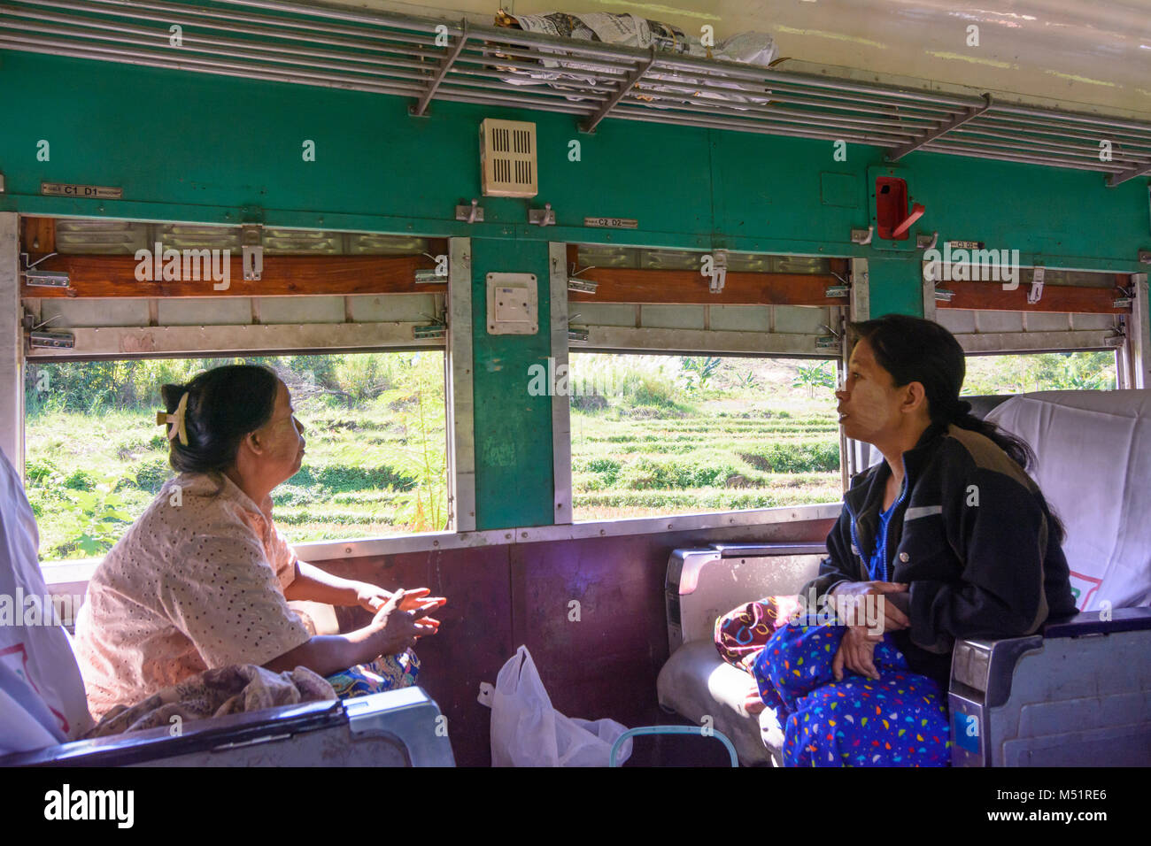 Hsipaw: train, upper class car, lady, paddy field, , Shan State ...