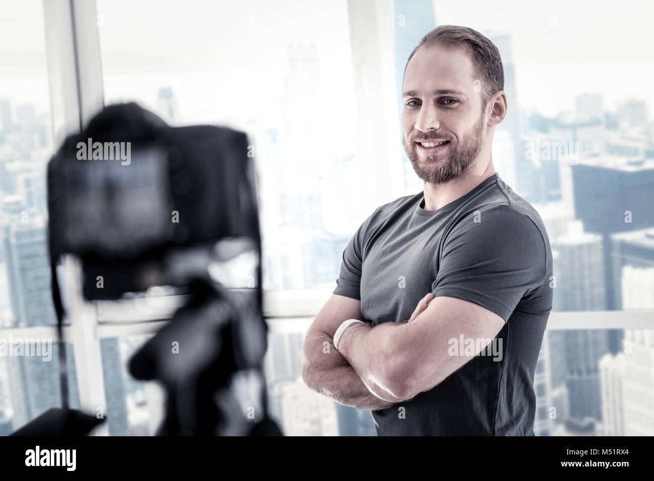 Optimistic male blogger introducing himself Stock Photo - Alamy