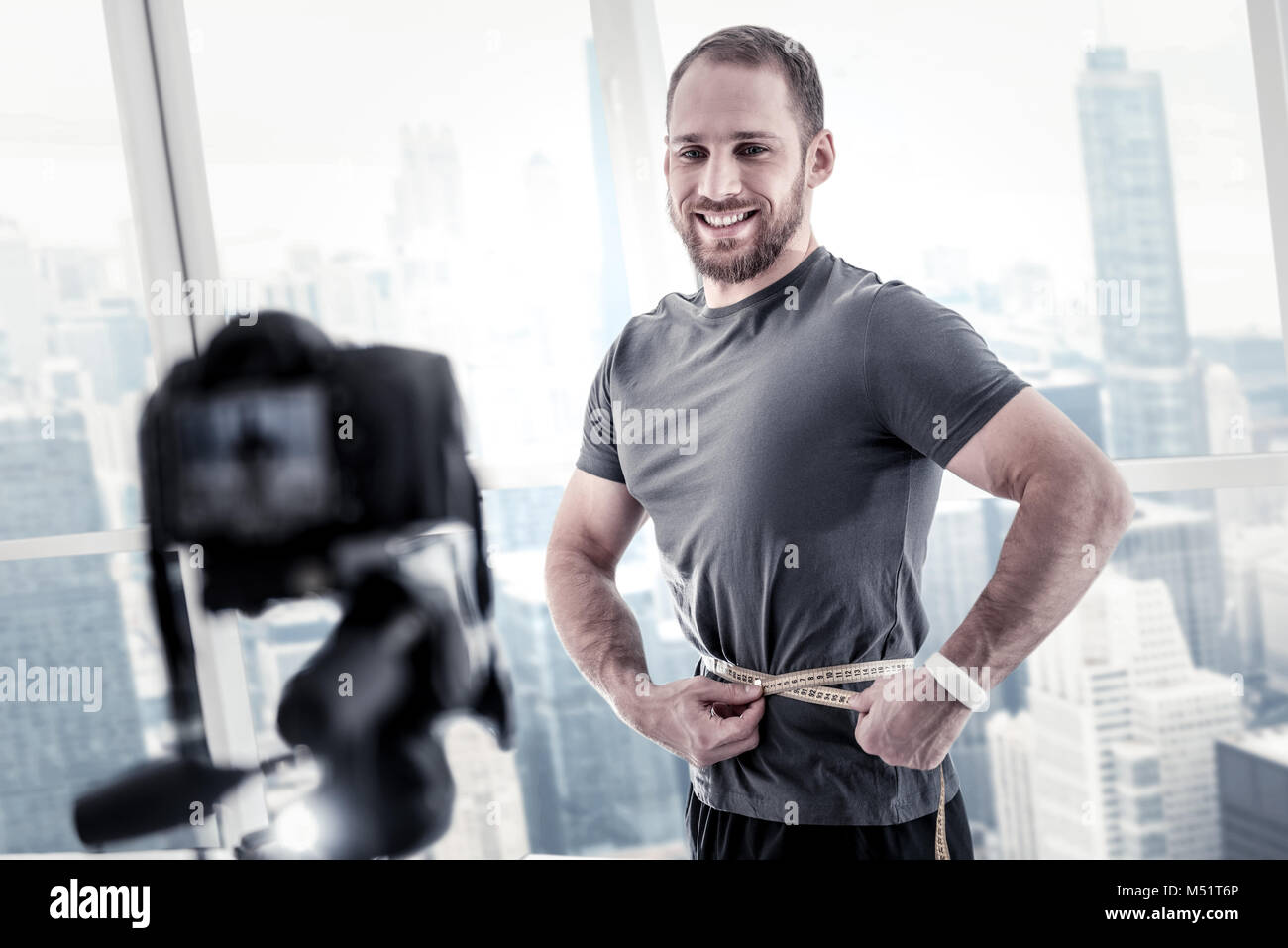Skillful male blogger sharing progress Stock Photo - Alamy