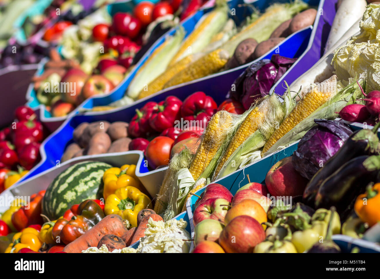 Farmers fruit market with various colorful fresh fruits and vegetables ...