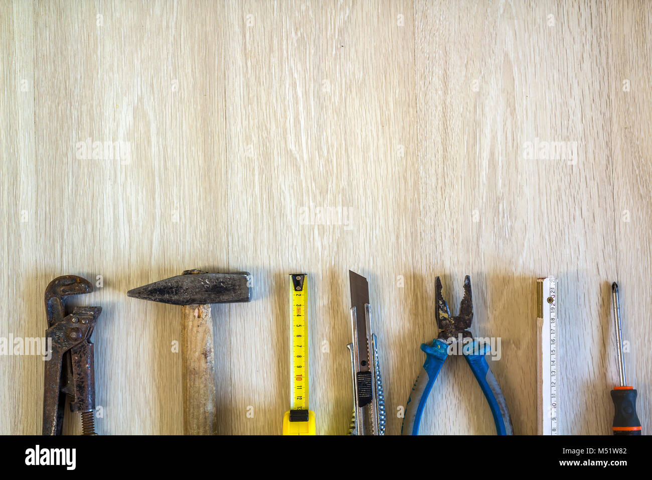 Construction, building and repair tools set for house work on wooden ...