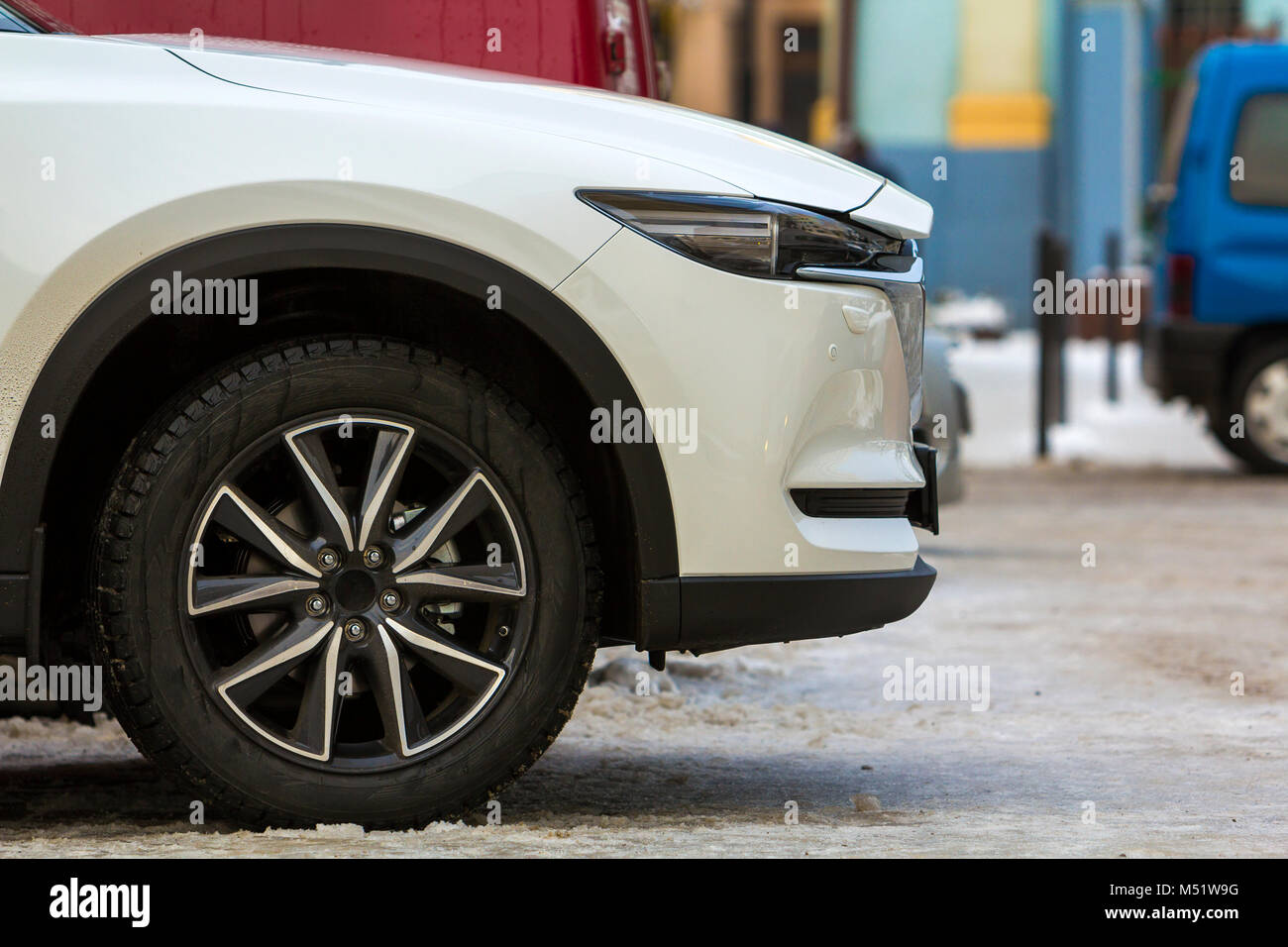 Front part of white modern car close up Stock Photo - Alamy