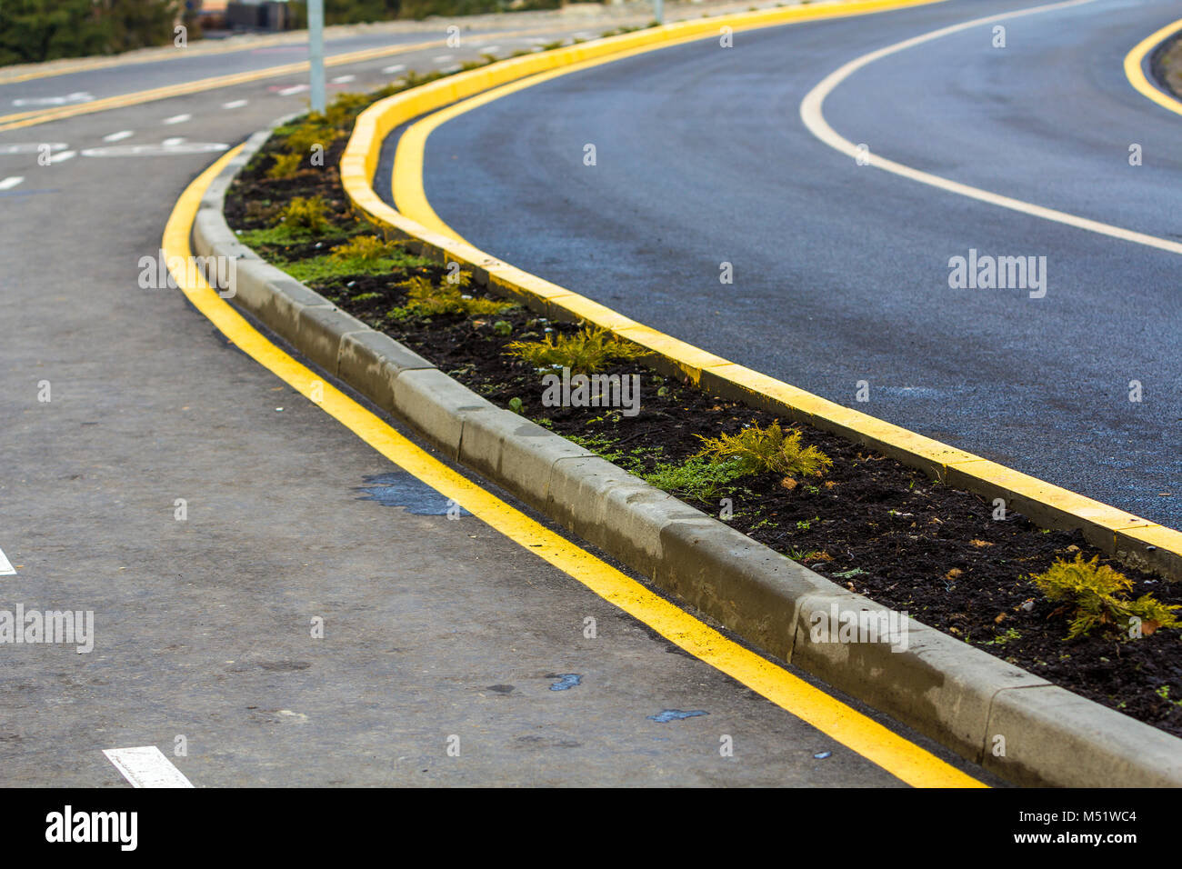 Walk way and bicycle lane signs on the asphalt road surface Stock Photo ...