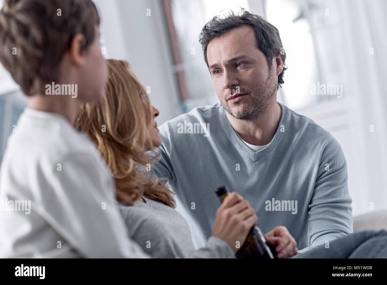 Kind man looking at his addicted wife and supporting her Stock Photo ...