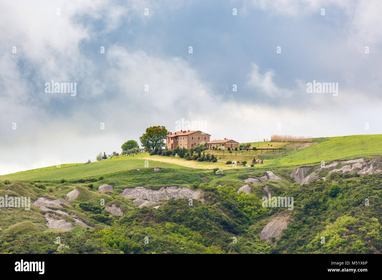 Farm on a slope hi-res stock photography and images - Alamy