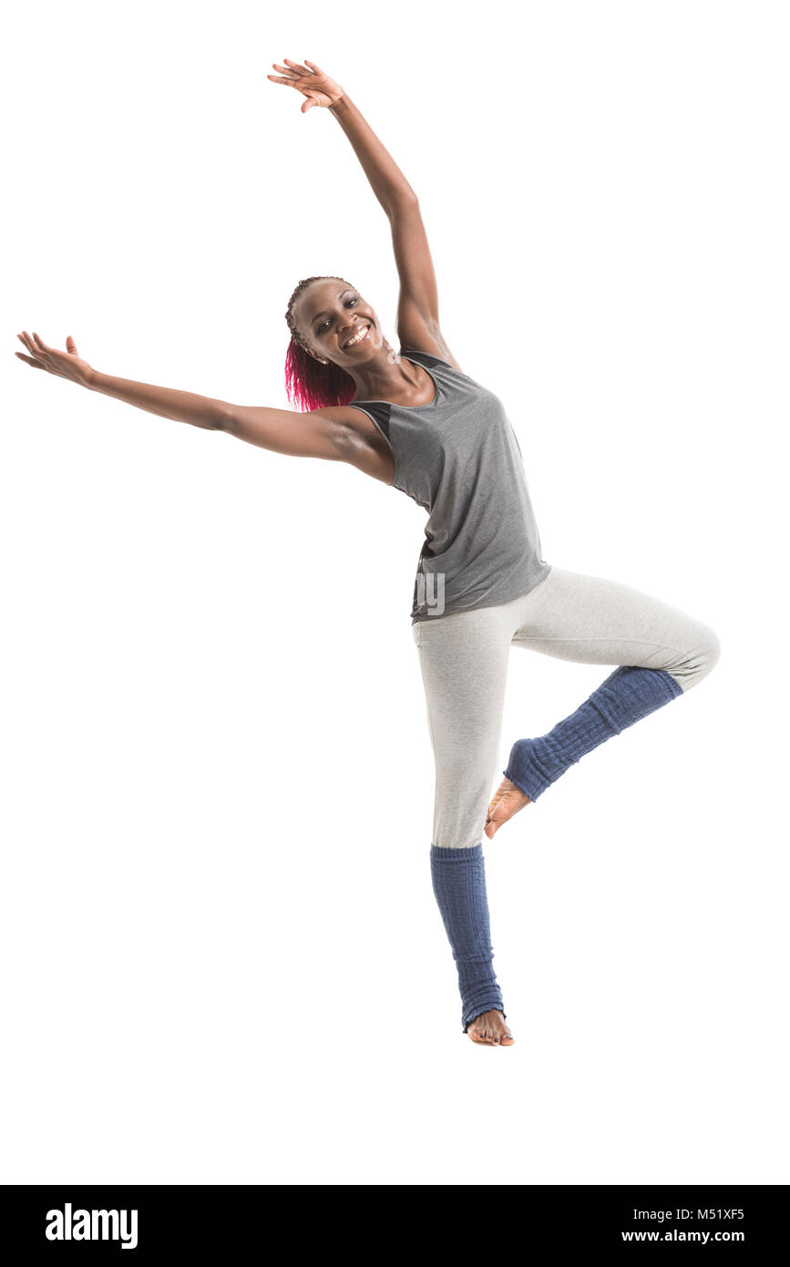 Young african woman practicing dancing isolated on white background ...
