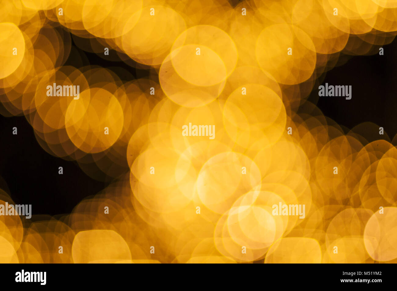 yellow lights out of focus near Stock Photo - Alamy