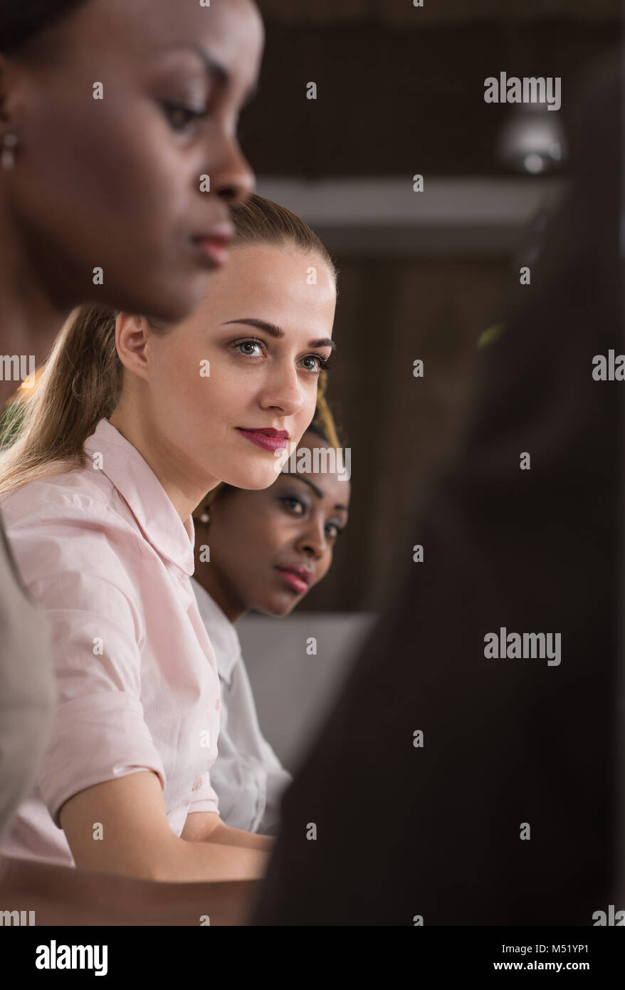Business people sitting in a row hi-res stock photography and images ...