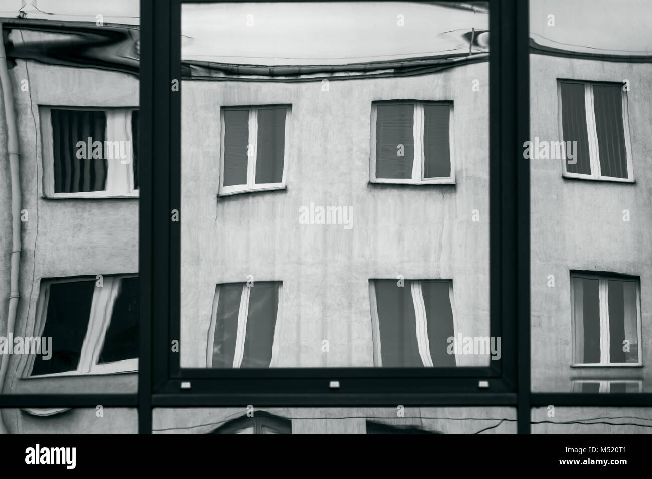 Distorted apartment window reflection Stock Photo - Alamy