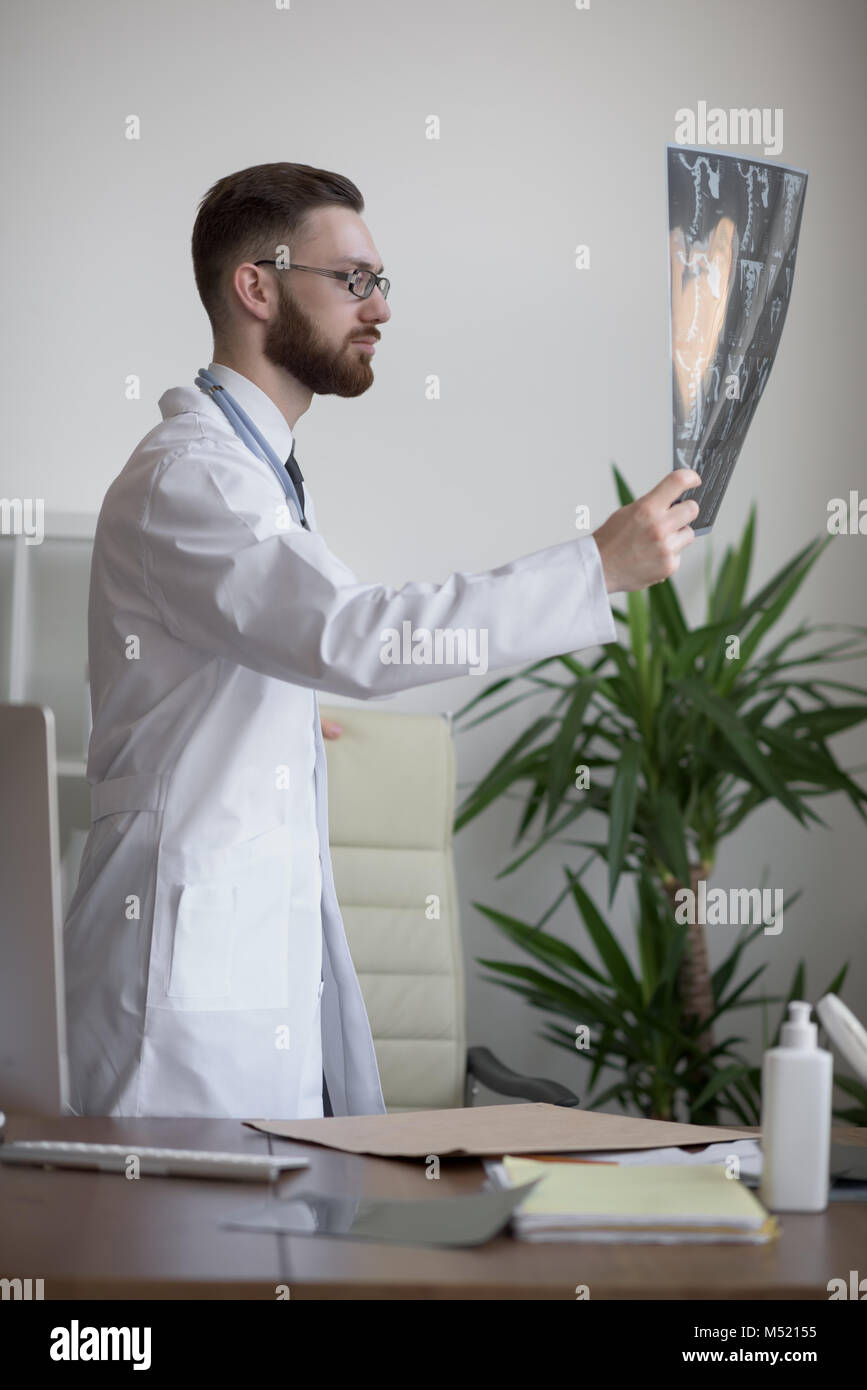 Doctor working with ct scan at hos workplace Stock Photo - Alamy