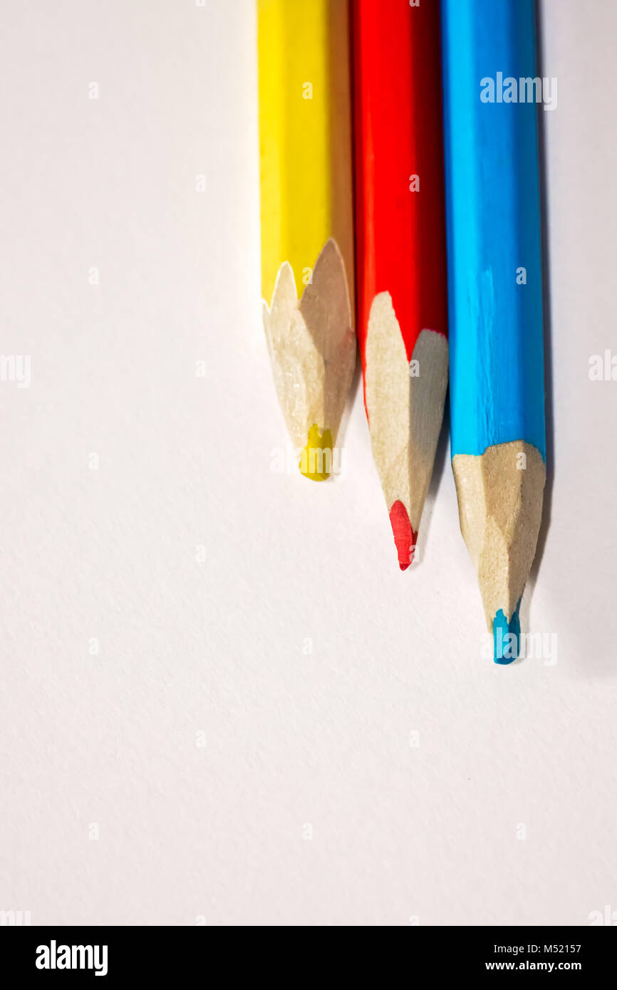 Colorful crayons on white paper Stock Photo - Alamy