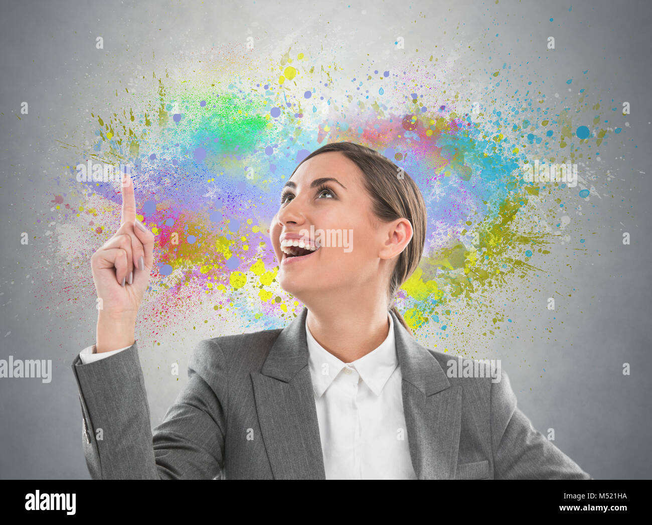Colorful Thinking. Business woman against gray background and colorful ...