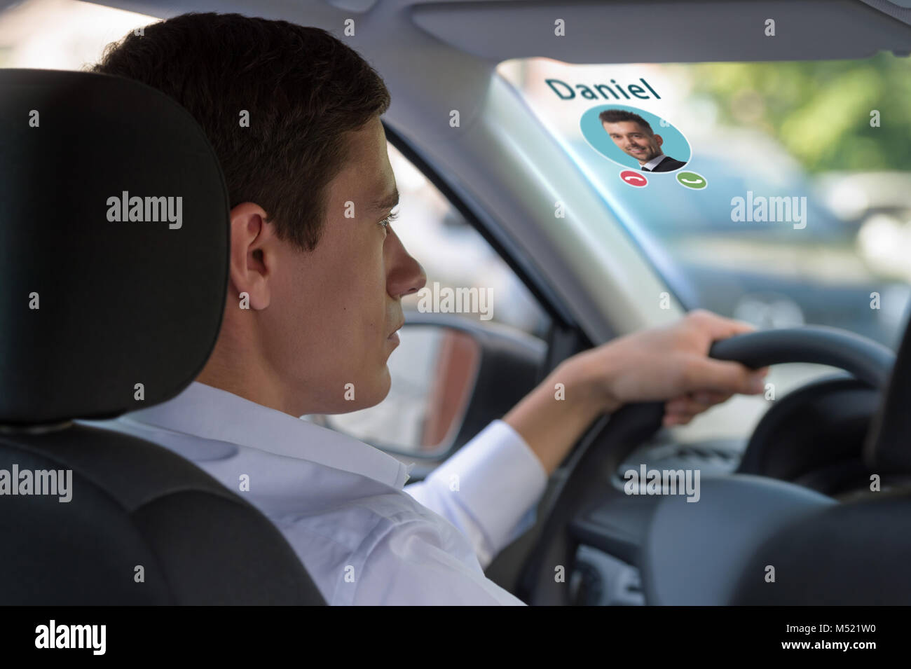 The young man behind the wheel driving car Stock Photo - Alamy