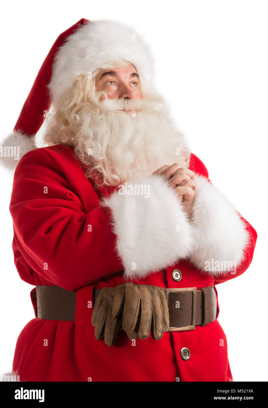 Praying Santa Claus portrait isolated over a white background Stock ...
