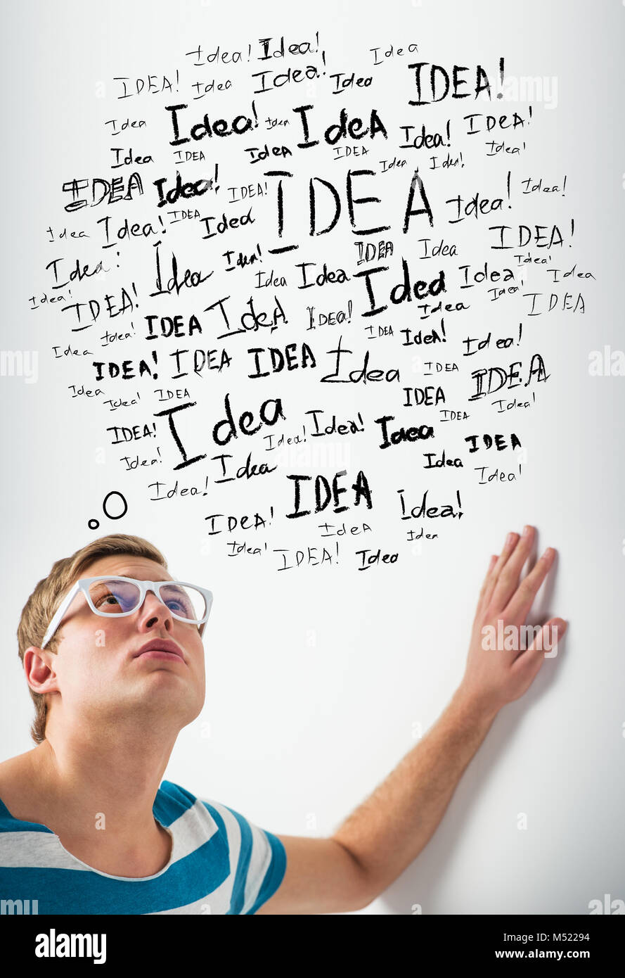 Idea concept. Young man with idea signs overhead Stock Photo - Alamy
