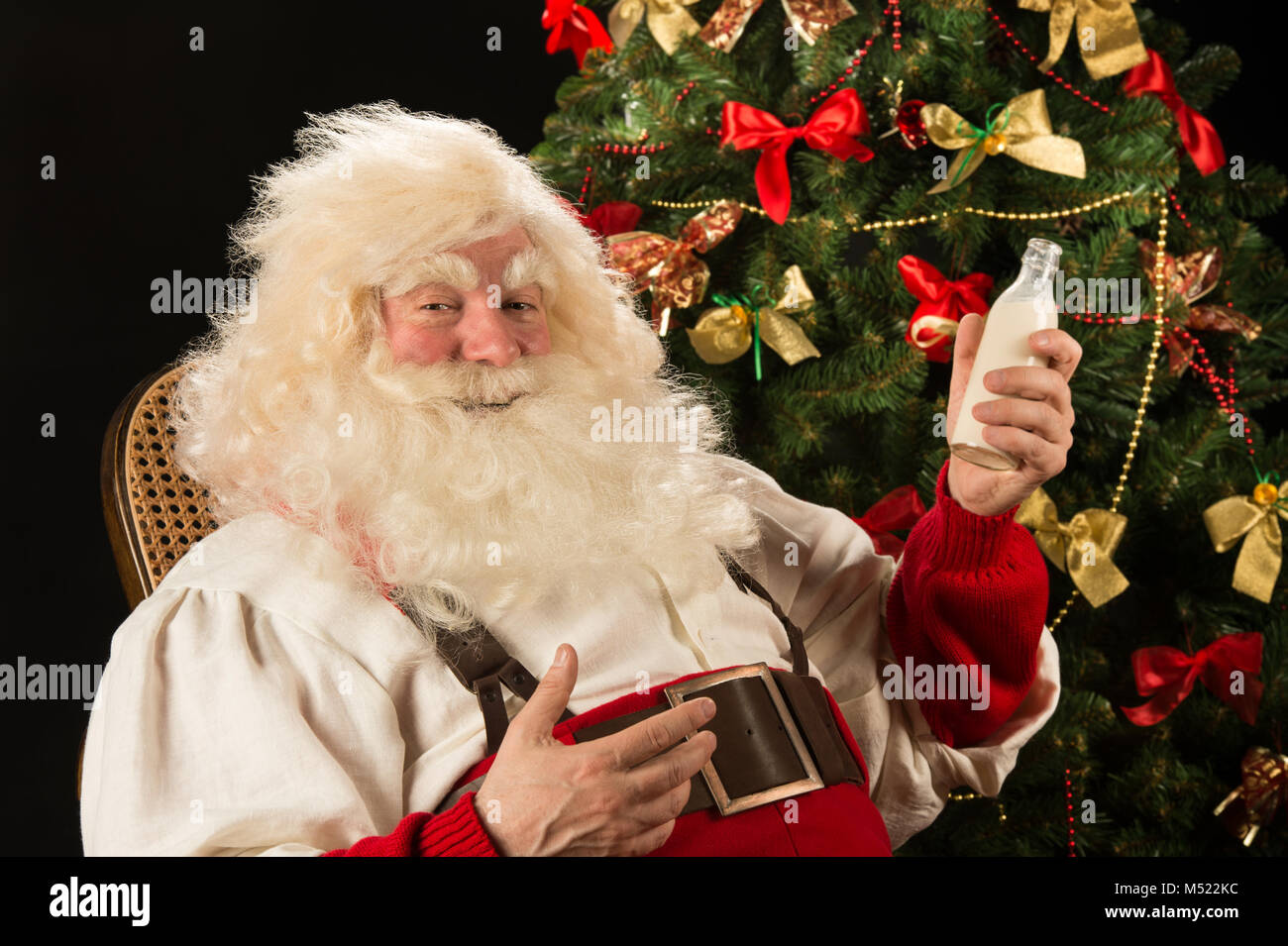 Santa claus drinking milk hi-res stock photography and images - Alamy